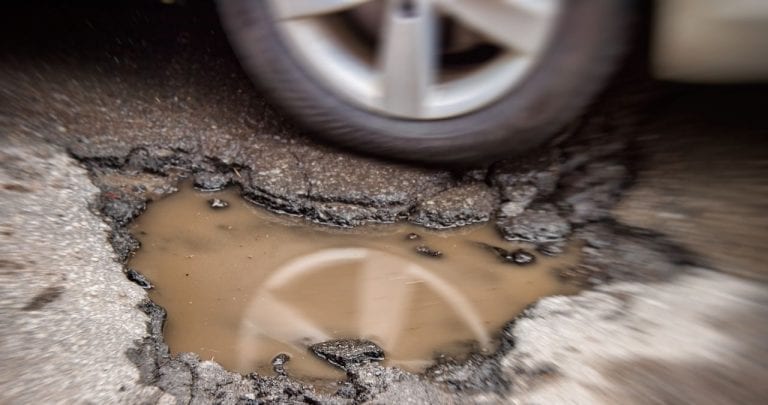 How To Tell If Your Car Was Damaged By A Pothole I Dave & Ray's Auto